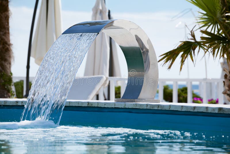 Swimming Pool Waterfall Jet Stock Photo - Image of seashore, shower ...