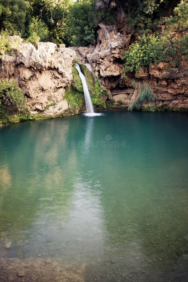 Waterfall on lake stock image. Image of colorful, ferny - 6081117