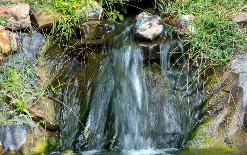 Waterfall Lawn Feature Flowing Stock Photo - Image of silky, missouri ...