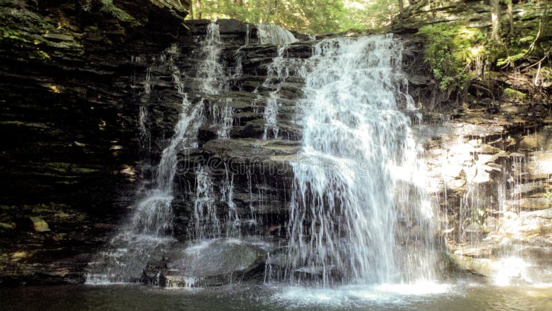 Waterfall light and shadow stock photo. Image of nature - 87325318