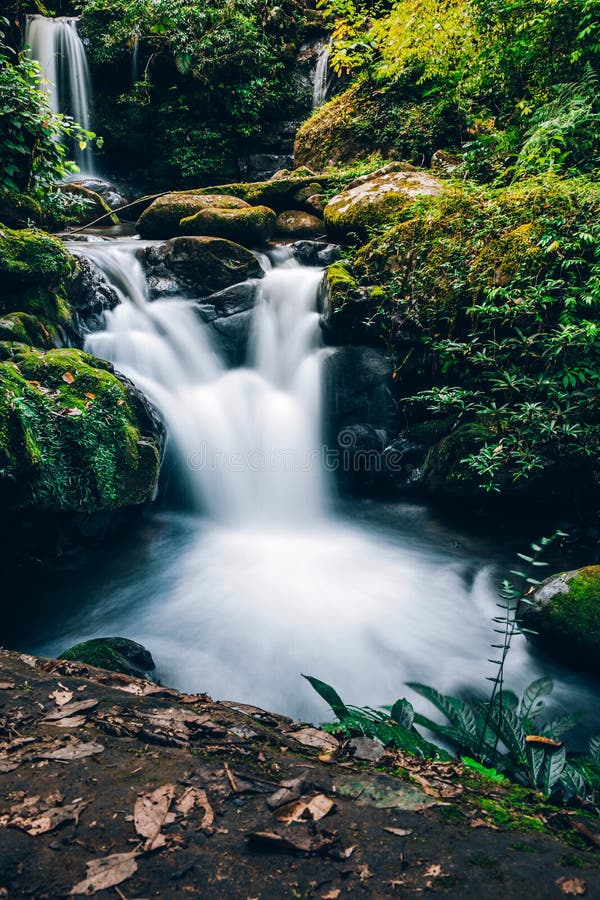 Waterfall Located in the Forest of Thailand. the Water Flows Over a ...