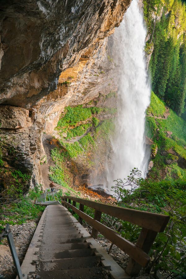 Waterfall and Man.Waterfall in the Mountains.stormy Stream of Water ...