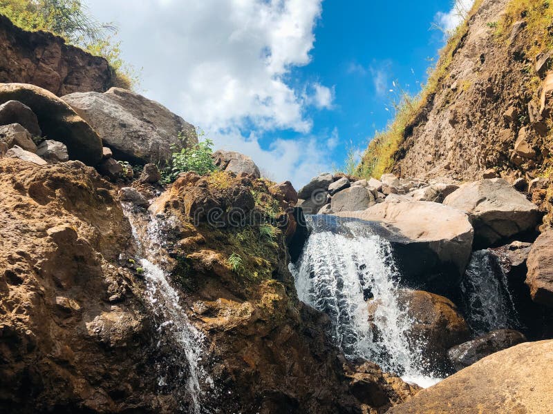 Waterfall in the Middle of Mountain Cliffs Stock Image - Image of ...