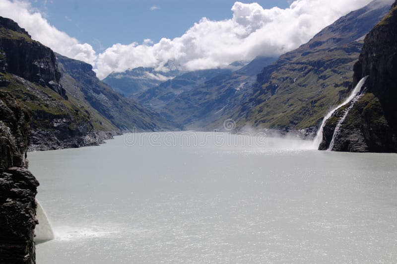 Waterfall on mountain lake stock image. Image of dumb - 19496781