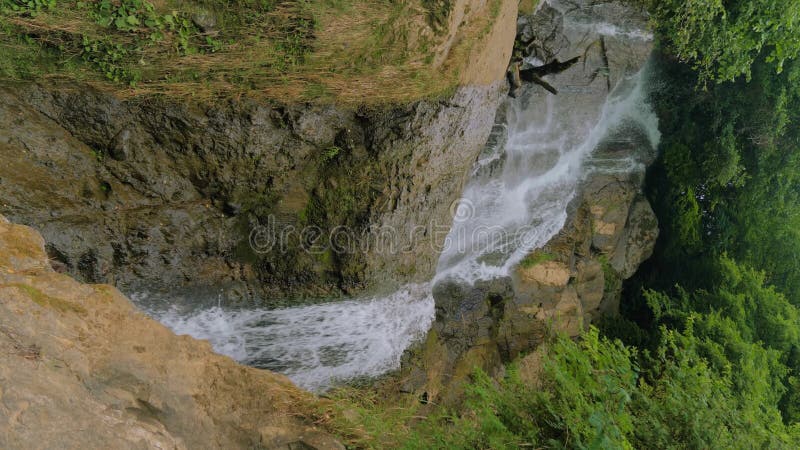 Waterfall in the Mountain - Stream Flowing and Falling Down - Vertical ...