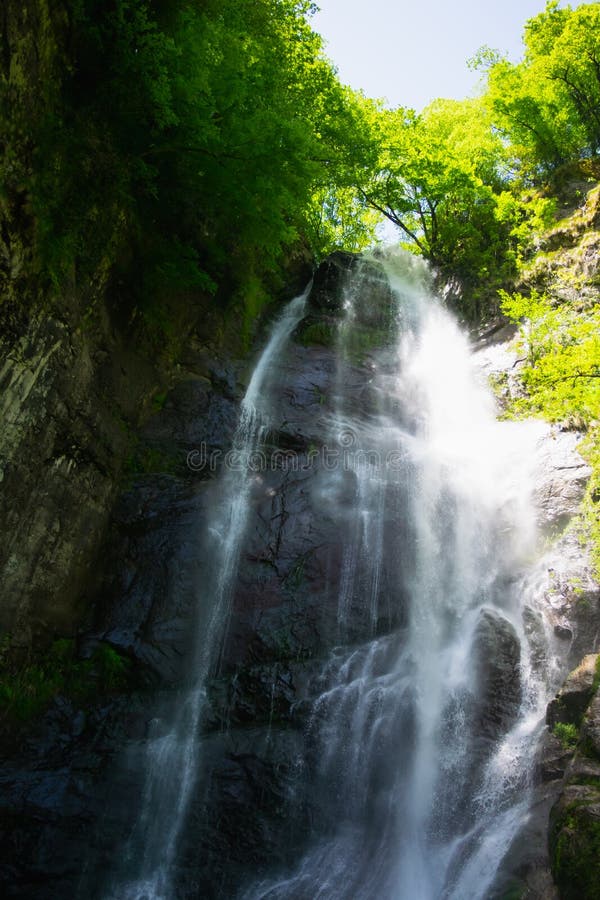Big Waterfall in the Mountains. Bottom View. Streams of Water Stock ...