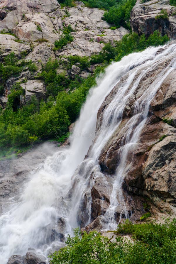 Waterfall in the mountains stock image. Image of famous - 268437585