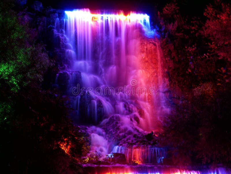 Waterfall with Multicolored Illumination at Night. Waterfall Lighting ...