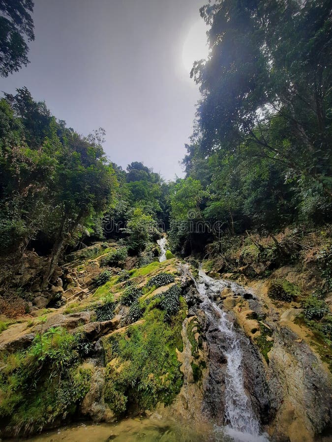 The Waterfall with Natural Beauty that Surrounds it Stock Photo - Image ...