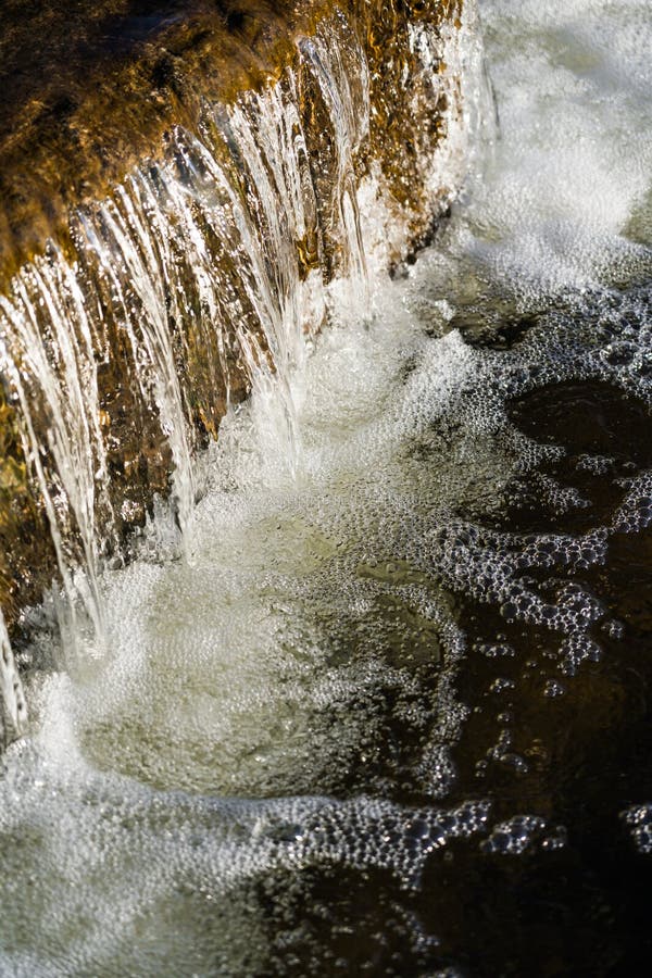 The Waterfall is Nearby. Falling Water in a Waterfall. Foam from the ...