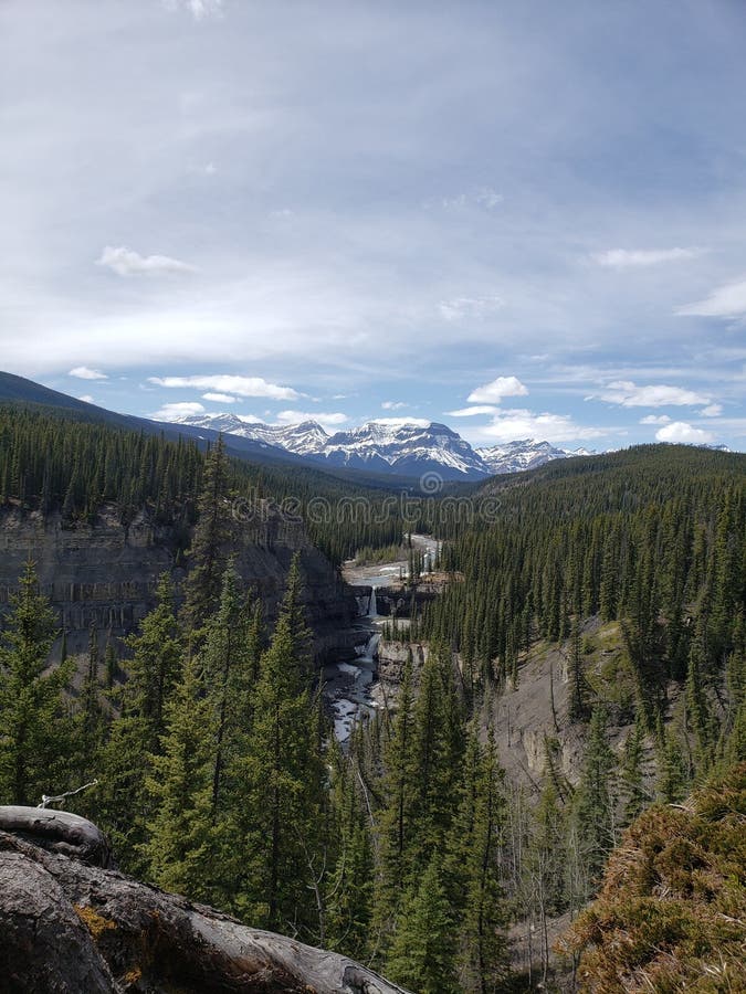 Waterfall in Nordegg Alberta with Mountains Stock Photo - Image of lake ...