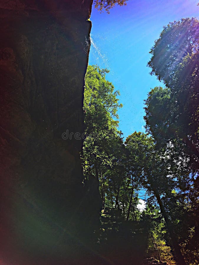 Waterfall off of cliff stock photo. Image of adventures - 73869976