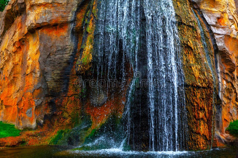 Waterfall over the cliff stock photo. Image of scene - 252634890