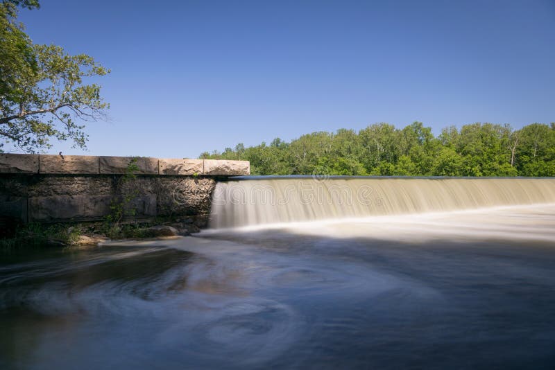 Waterfall over dam stock image. Image of potomac, long - 55073597