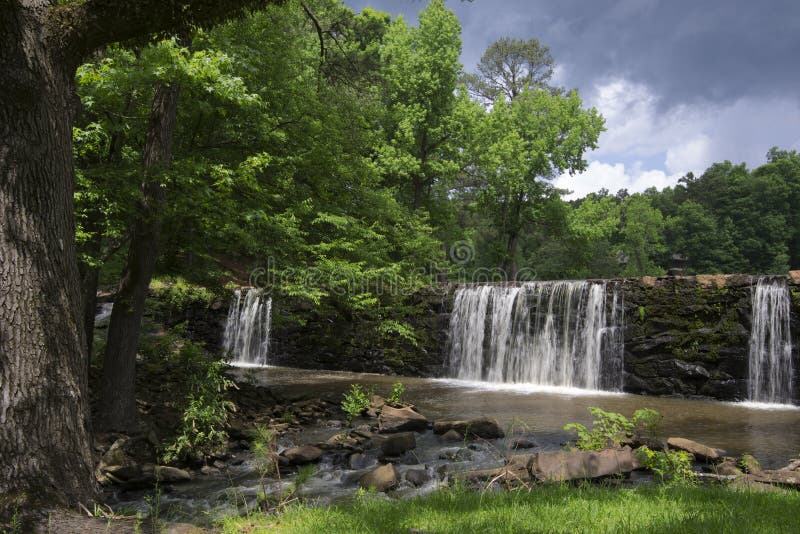 Waterfall over the Dam stock photo. Image of rocks, green - 79251776