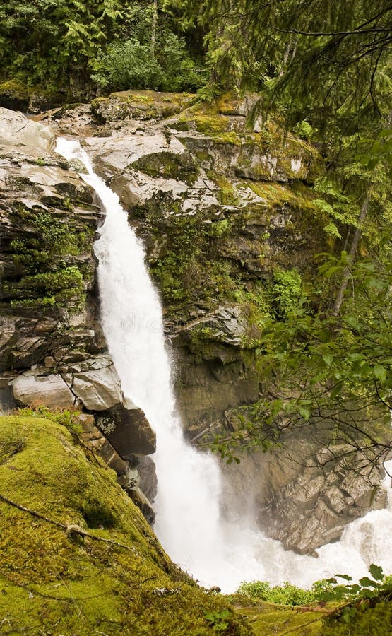 Waterfall Over Mossy Rocks Picture. Image: 6605362
