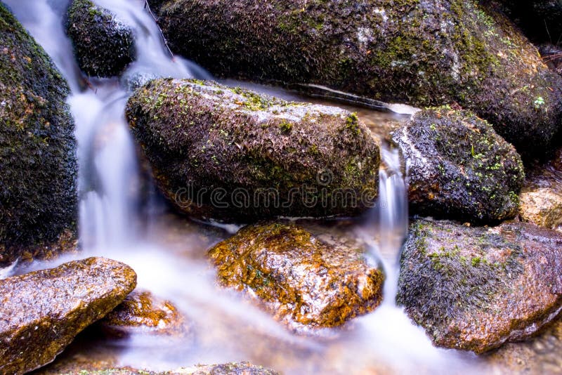 Waterfall over rocks stock photo. Image of freshness - 143161236