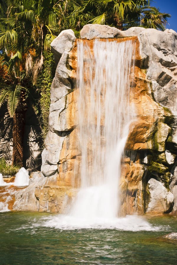 Waterfall over the Rocks stock image. Image of sunshine - 17407571