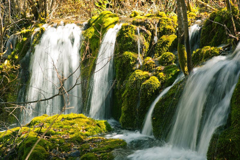 Waterfall over rocks stock photo. Image of jiuzhaigou - 21760810