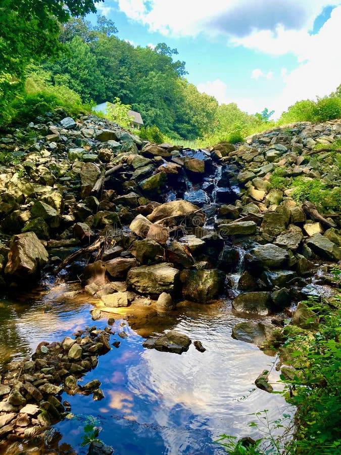 Waterfall over rocks stock photo. Image of stream, descent - 195305674