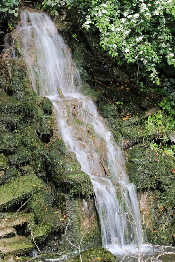 Waterfall Over Stones into Pond Stock Image - Image of movement ...
