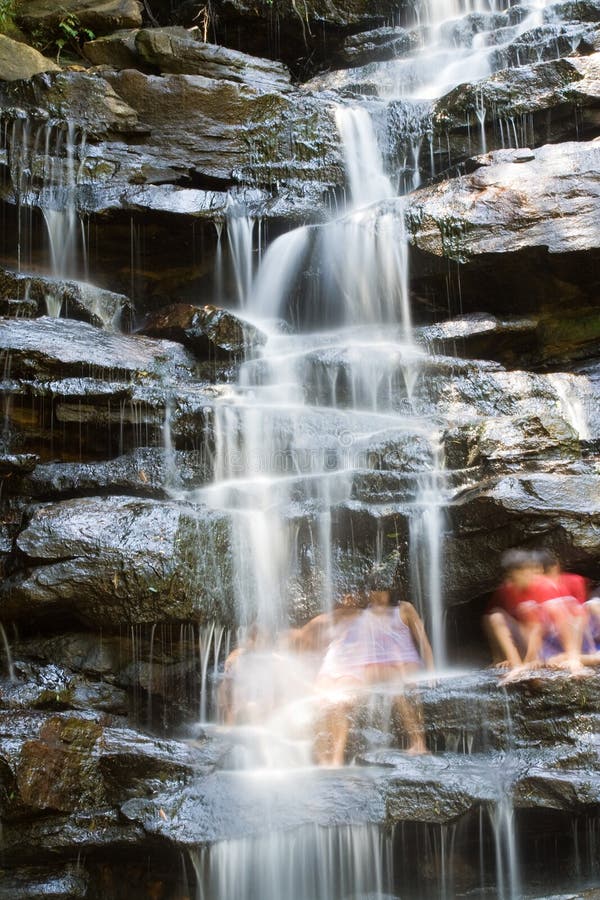 Waterfall people stock image. Image of people, color - 13007157