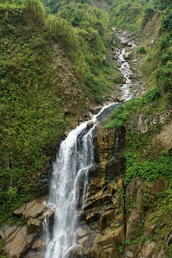 Waterfall Plunging into a Gorge Stock Photo - Image of stream, rocks ...