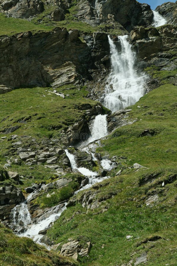 Waterfall in Pure Alpine Nature Stock Photo - Image of vertical ...
