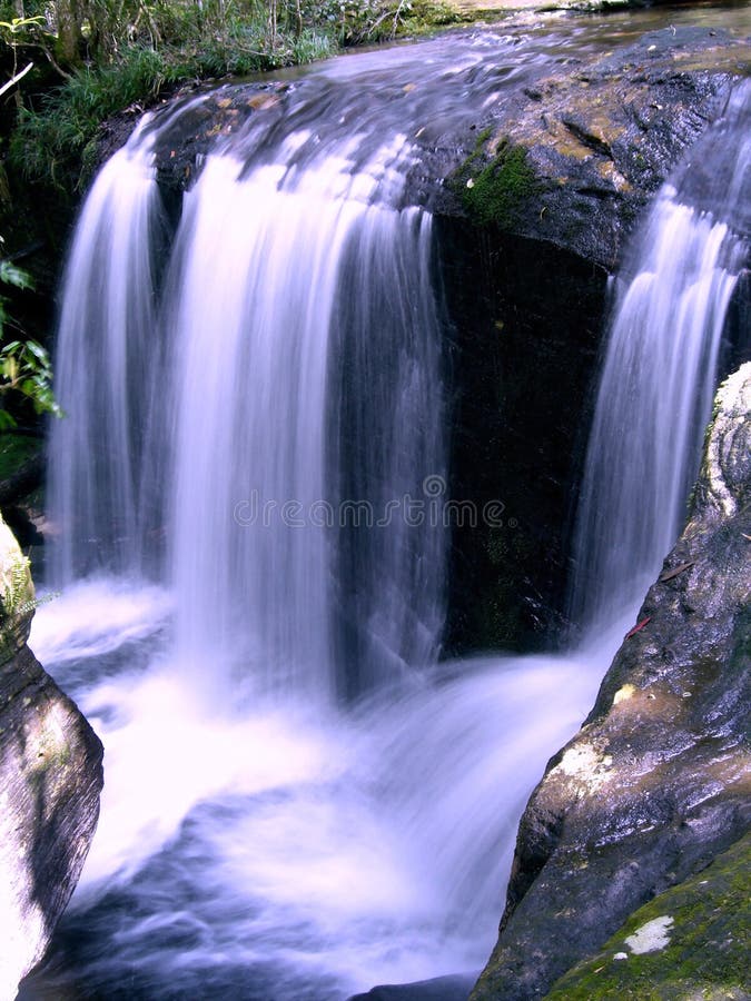 Waterfall in rain forest stock photo. Image of destinations - 40793902