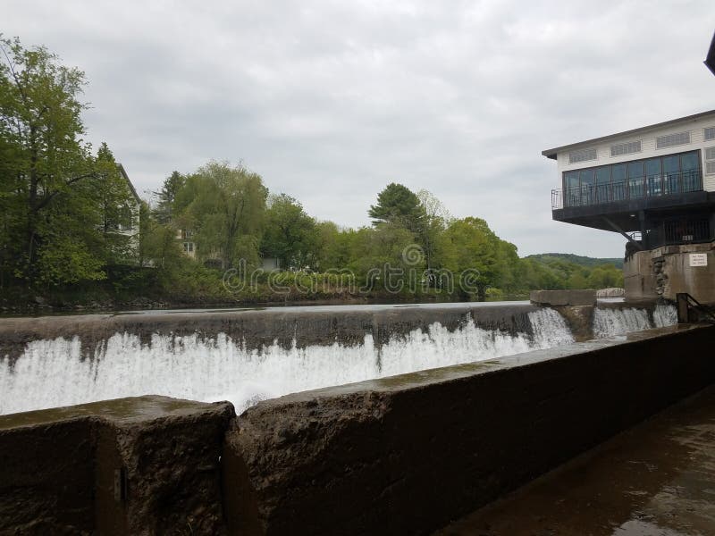 Waterfall or Rapids and Trees and Building Stock Image - Image of ...