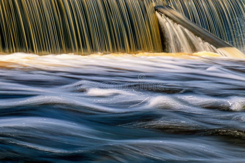 Waterfall at a River with Blurry Water Stock Photo - Image of nature ...