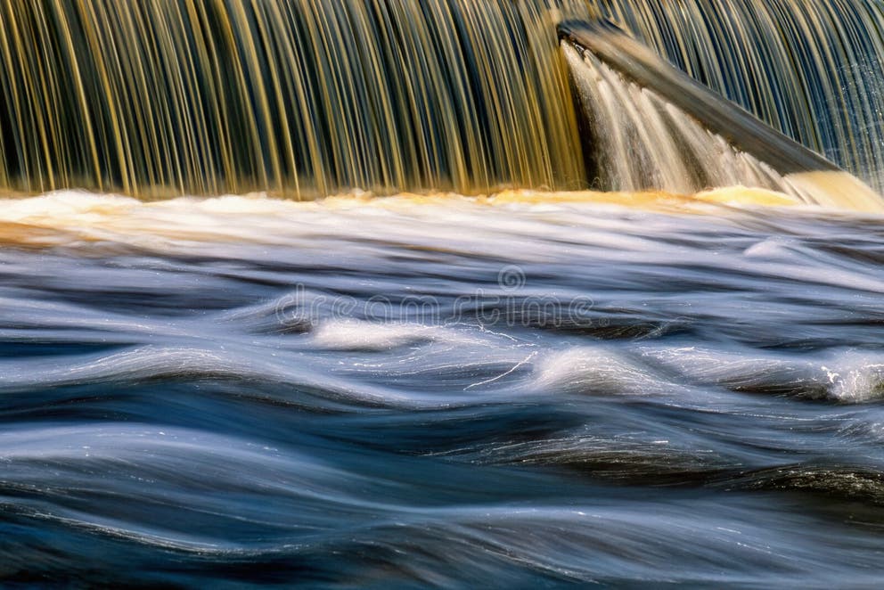 Waterfall at a River with Blurry Water Stock Photo - Image of nature ...