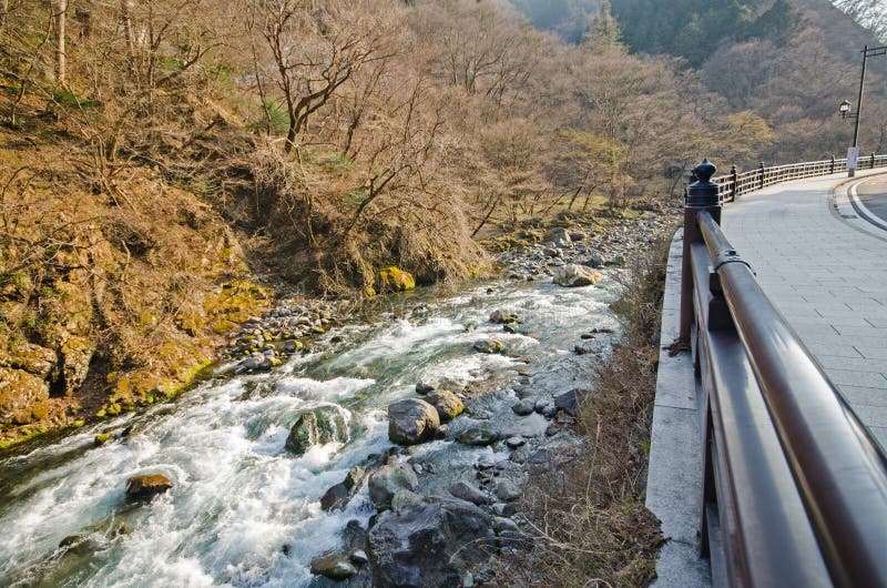 Waterfall River with Sidewalk Path on Hills Stock Photo - Image of ...