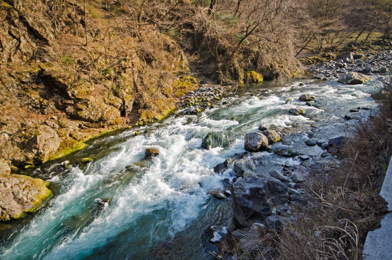 Waterfall River with Sidewalk Path on Hills Stock Photo - Image of ...