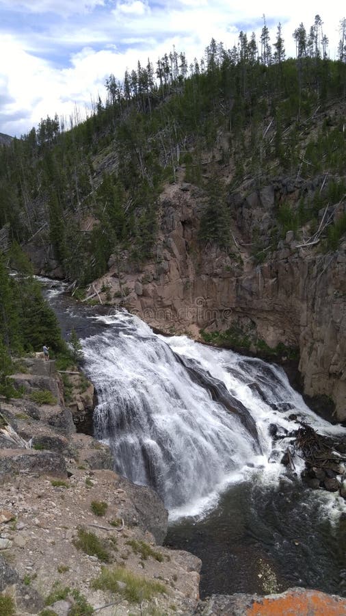 Waterfall into a river stock image. Image of amazing - 129958413