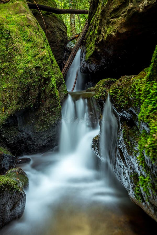 Waterfall through the Rock Chasm in Mountain Gully Stock Image - Image ...