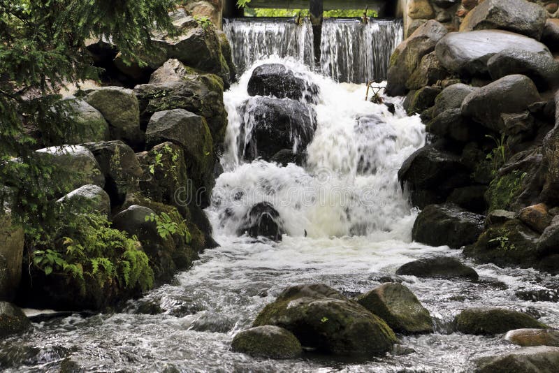 Waterfall with rocks stock photo. Image of outdoors - 130809384