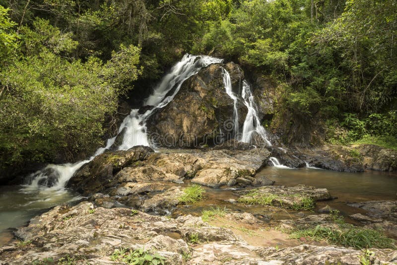 Waterfall among the Rocks in the Forest Stock Image - Image of nature ...
