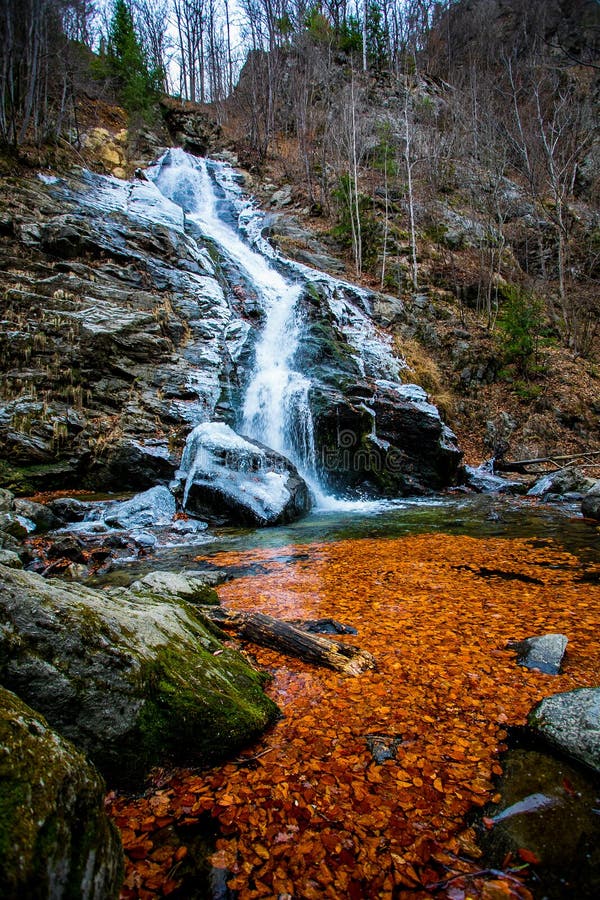 Waterfall and Rocks and Ice Stock Photo - Image of blue, ground: 168814560