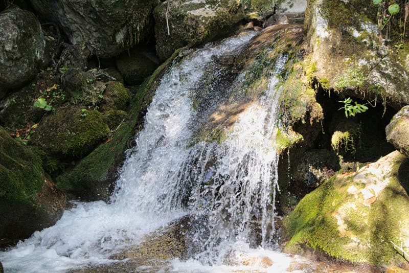 Waterfall between Rocks in the Mountain Stock Photo - Image of mountain ...