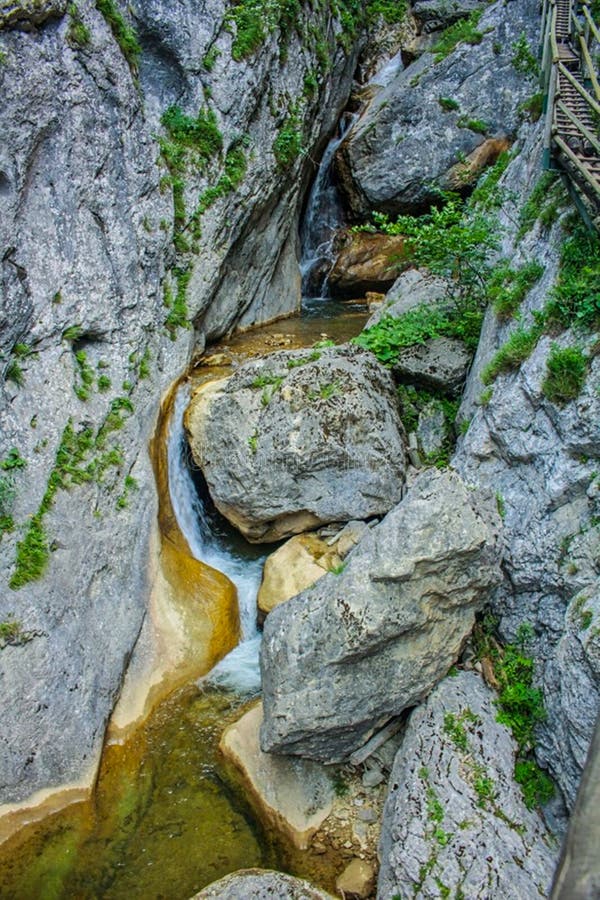 Waterfall between Rocks in the Mountain Stock Image - Image of rock ...