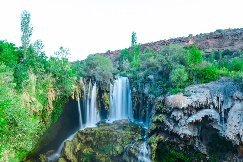 Waterfall between Rocks and Trees Stock Photo - Image of rocks, water ...