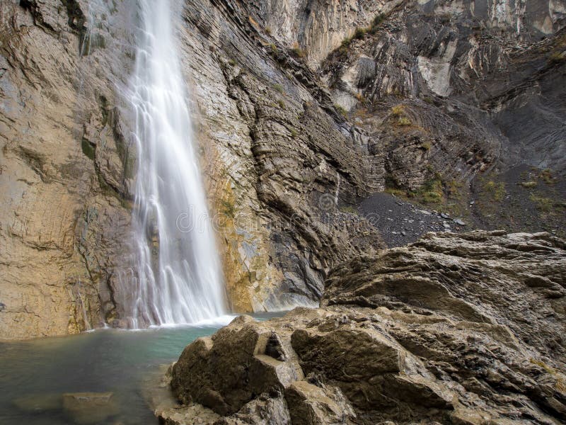 Waterfall in a Rugged Cliff Stock Image - Image of flow, natural: 80236397