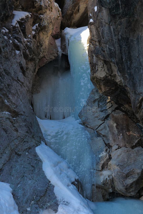 The Waterfall Runs Off the Cliff in Winter Stock Image - Image of ...