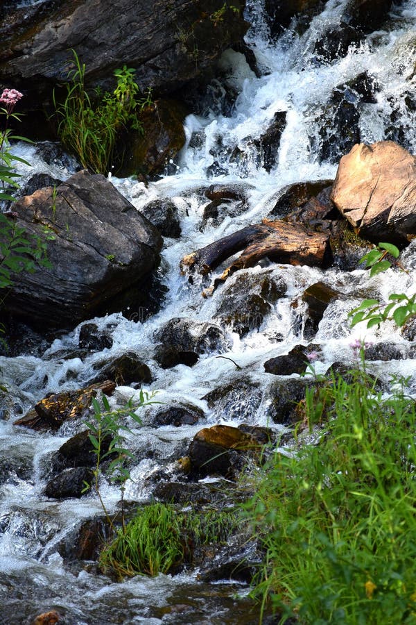 Waterfall stock photo. Image of rocks, water, rushing - 99656872