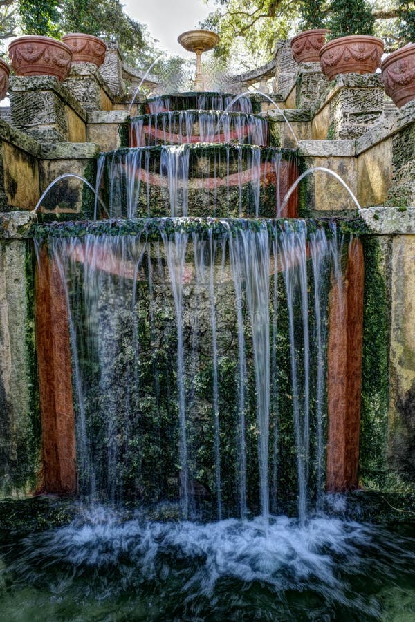 Waterfall in Rustic Old World Garden Landscaping Stock Photo - Image of ...