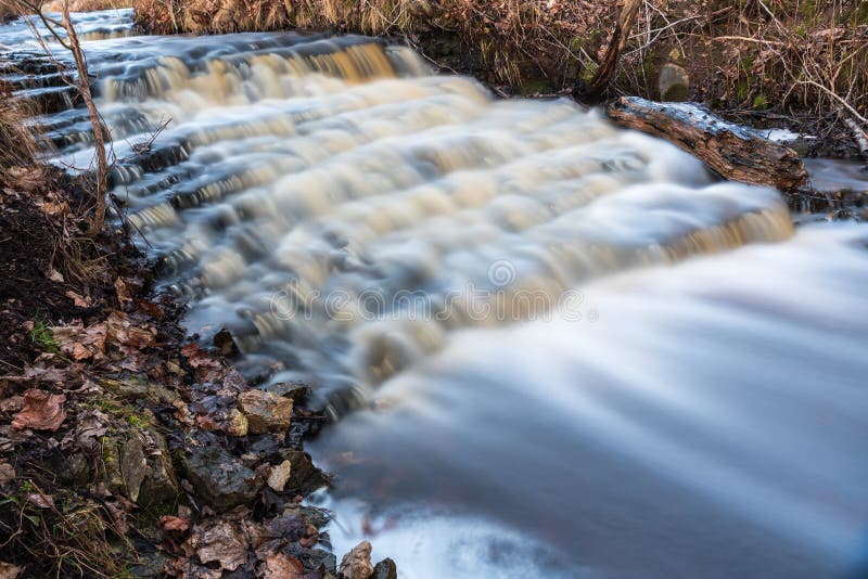 Waterfall in Several Stages and Fallen Leaves Stock Photo - Image of ...
