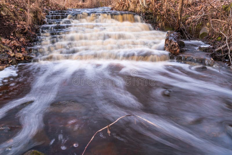 Waterfall in Several Stages and Fallen Leaves Stock Image - Image of ...
