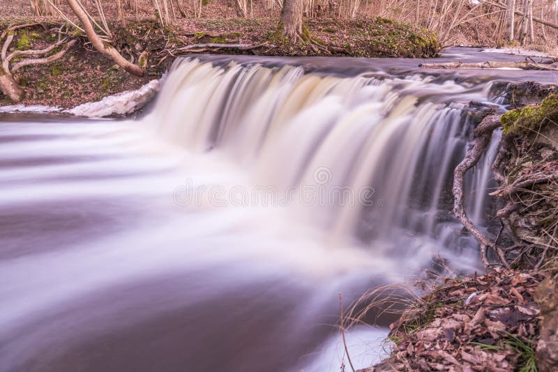 Waterfall in Several Stages and Fallen Leaves Stock Image - Image of ...