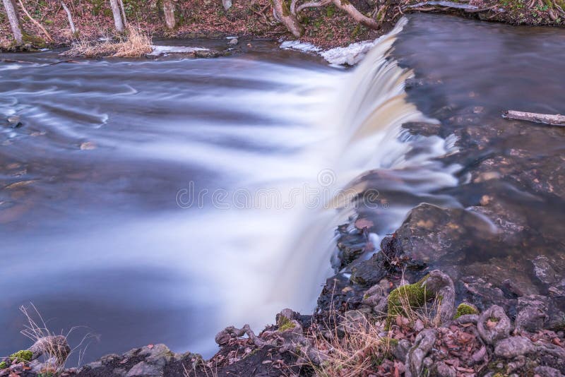 Waterfall in Several Stages and Fallen Leaves Stock Image - Image of ...
